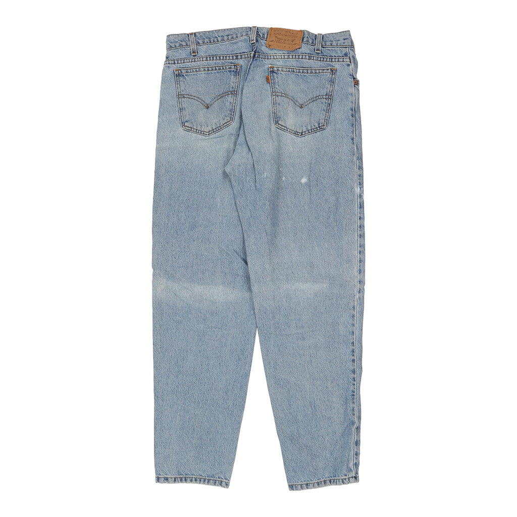Orange Tab 550 Levis Jeans - 34W 30L Light Wash Cotton – Thrifted.com